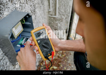 Positive and negative multimeter probes Stock Photo - Alamy