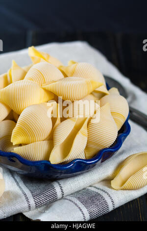 Big Italian pasta shells for stuffing, uncooked Stock Photo - Alamy