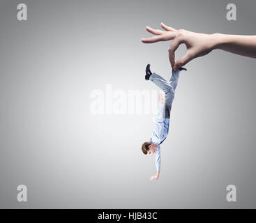 Big human hand catching businessman. Professional relations Stock Photo ...