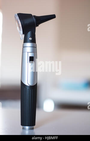 Otoscopy of ears with otoscope. ENT doctor. Consultation with ...