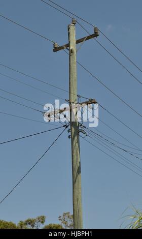power lines for australian power pole electricity grid against cloudy ...