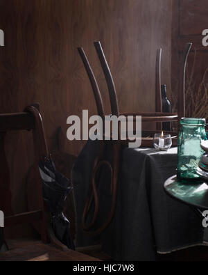 Upside down interior of restaurant with furniture fixed to the ceiling ...