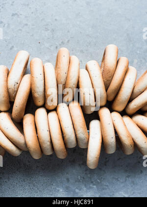 High angle view of bagels in crumpled paper on wooden table Stock Photo ...