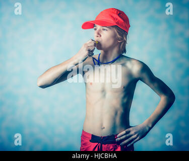 lifeguard boy with equipment Stock Photo - Alamy