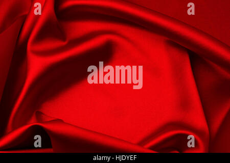 Closeup of ripples in red silk fabric Stock Photo - Alamy