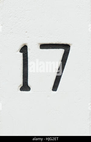 House number 17 sign on red brick wall Stock Photo - Alamy