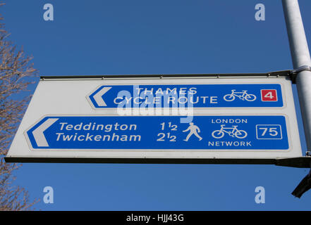 signs for the thames cycle route and london cycle network with ...