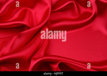 Closeup of ripples in red silk fabric Stock Photo - Alamy