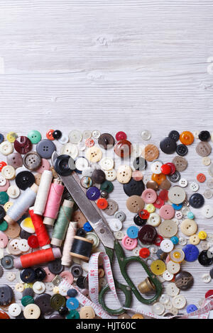 Old Sewing accessories on wooden table Stock Photo - Alamy