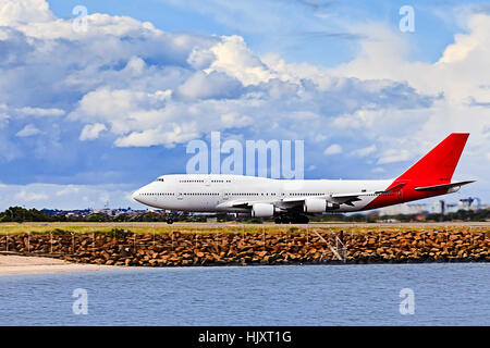Airplane landing on runway side view touchdown with tire smoke Stock ...