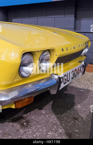 Front view of a yellow classic Reliant Scimitar sports car withbonnet ...