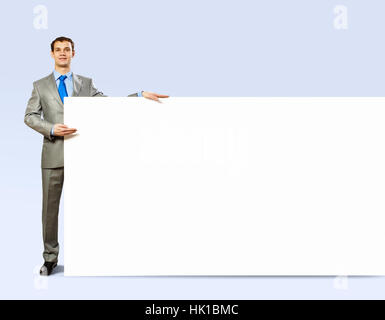 Advertising manager with billboard. Place for text Stock Photo - Alamy
