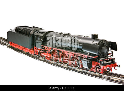Isolated toy train with a steam engine locomotive Stock Photo - Alamy