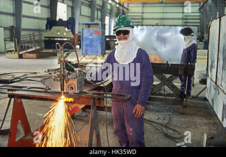 Dock workers in Freeport, Bahamas Stock Photo - Alamy
