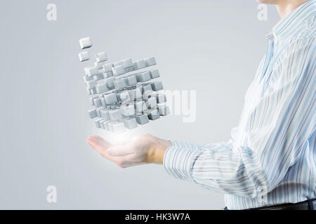 Businessman hand shows cube as symbol of problem solving Stock Photo ...