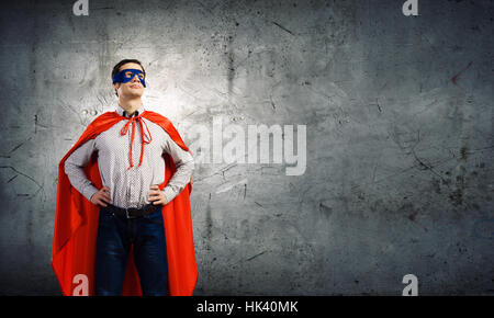 Young man wearing superman mask and cape Stock Photo - Alamy