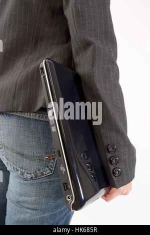 carry laptop under arm Stock Photo - Alamy