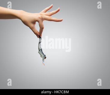 Big human hand catching businessman. Professional relations Stock Photo ...
