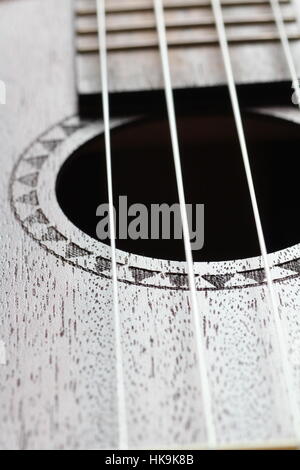 Close up of Ukelele Strings and Sound hole Stock Photo - Alamy