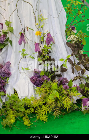 skirt of traditional costume decorated with flowers, note shallow depth ...