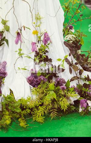 skirt of traditional costume decorated with flowers, note shallow depth ...