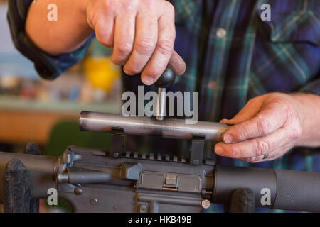 Fitting lapping bar into scope rings Stock Photo - Alamy