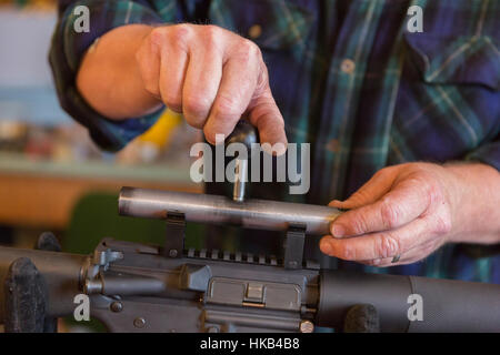 Fitting lapping bar into scope rings Stock Photo - Alamy