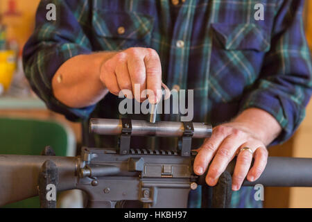 Fitting lapping bar into scope rings Stock Photo - Alamy