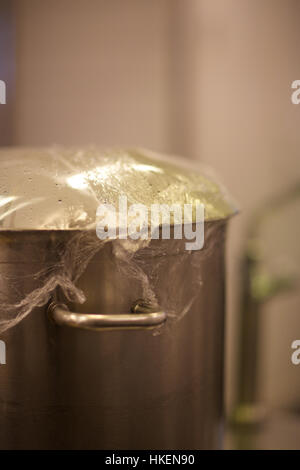 Pot boiling over Stock Photo - Alamy