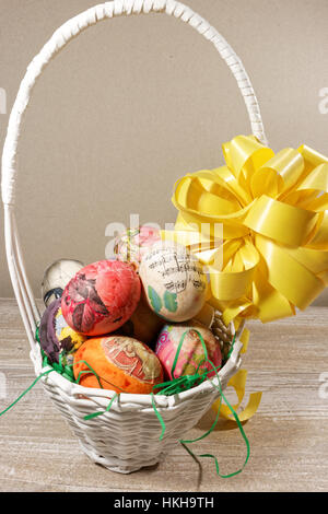 Easter eggs in wicker basket on green meadow Stock Photo - Alamy