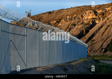 EL PASO, TX - Colin McDonald walks inside the border fence in El Paso ...