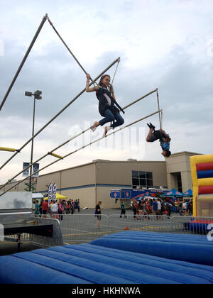 Children bungee jumping Stock Photo - Alamy