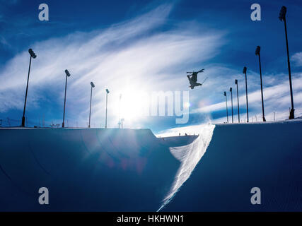 Skier doing an inverted trick in winter snow halfpipe Stock Photo - Alamy