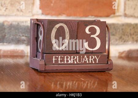 February 3rd. Day 3 of month, Calendar date. Office workplace with ...