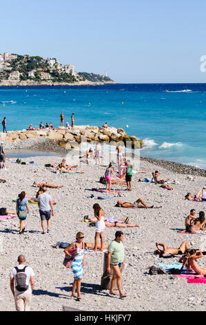 People sunbathe on the beach of Nice, southern France, Friday, July 14 ...