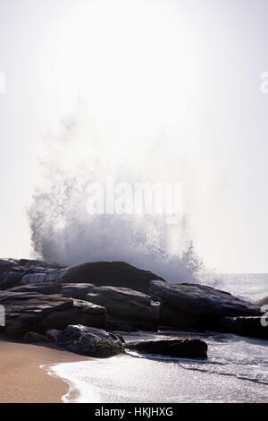 A natural view of big waves hitting the rock in the seashore Stock ...