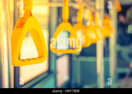 Handle loop in sky train Stock Photo - Alamy