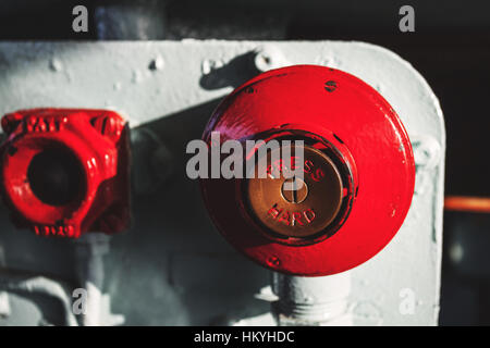 Red button on industrial machine for cancel and emergency stop of ...