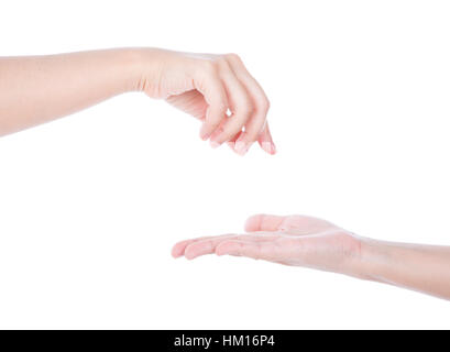 Two human hands hold several hearing aids of various colors and designs ...