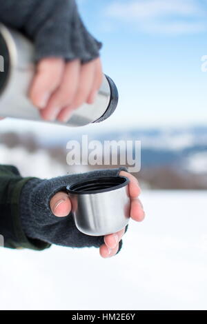 Hand reaching for white snow on a cold winter day Stock Photo - Alamy