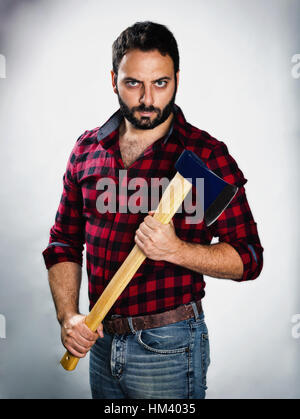 Lumberjack with plaid shirt in dark style Stock Photo - Alamy