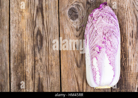 Cut red bok choy on a wooden background Stock Photo - Alamy