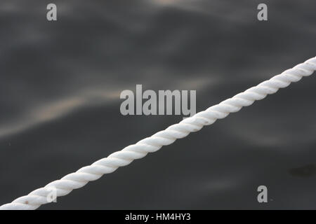 heavy duty anchor rope tied to a pole Stock Photo - Alamy