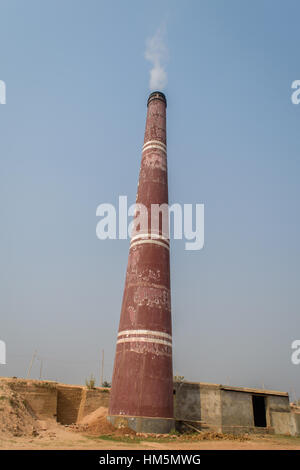 Chimney of a brick making machine Stock Photo - Alamy