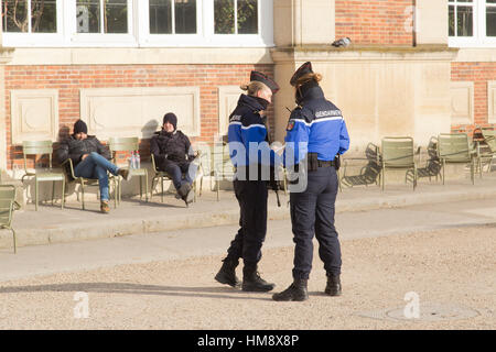 Female Gendarmerie in the Luxembourg Gardens in Paris France in winter ...