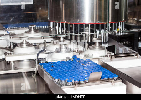 Ampoule filling and sealing machine Stock Photo: 133492268 - Alamy