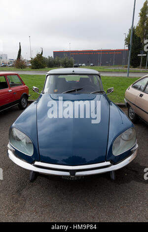 A beautiful classic blue Citroen DS with a white roof driving through a ...