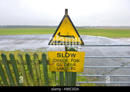 Yellow warning sign - gliders landing Stock Photo: 133029497 - Alamy