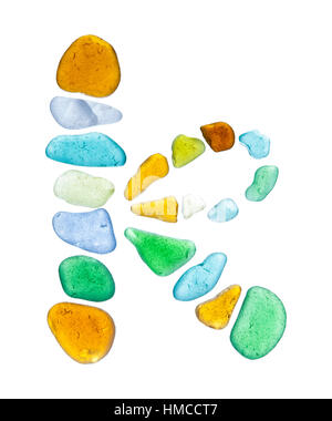 backlit sea glass peices isolated on white background, shape of a wave ...