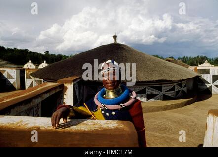 Ndebele woman wearing idzilla, bronze or copper neck rings, South ...